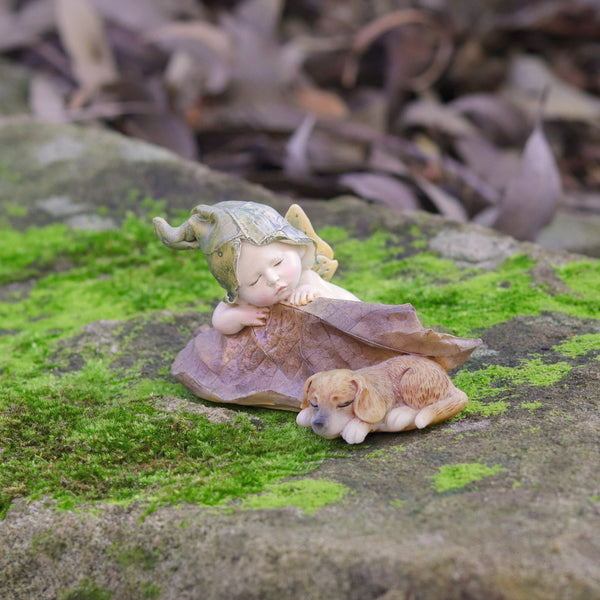 Baby Fairy Asleep on a Leaf next to her little Puppy Friend Faerie Store